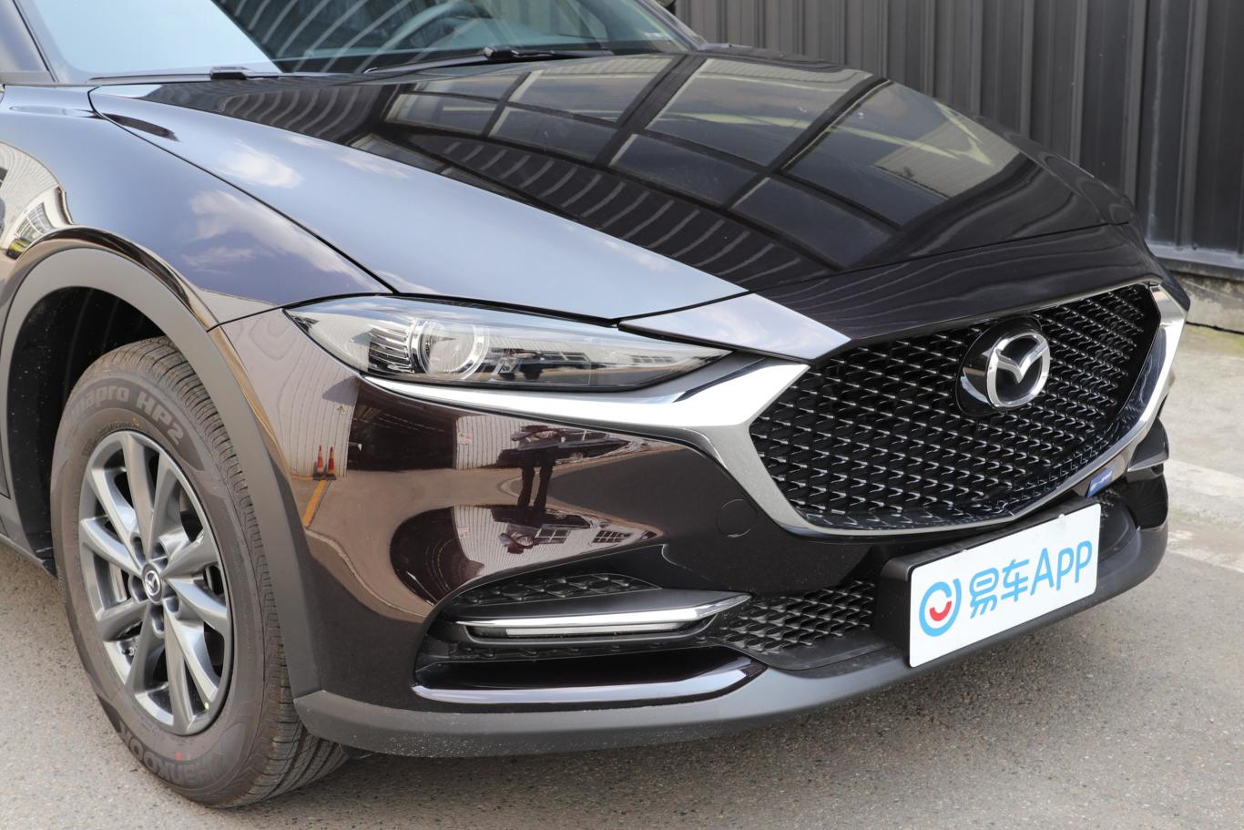 【马自达CX-42.0L 手自一体 两驱 蓝天活力版前格栅侧俯拍图片-汽车图片大全】-易车