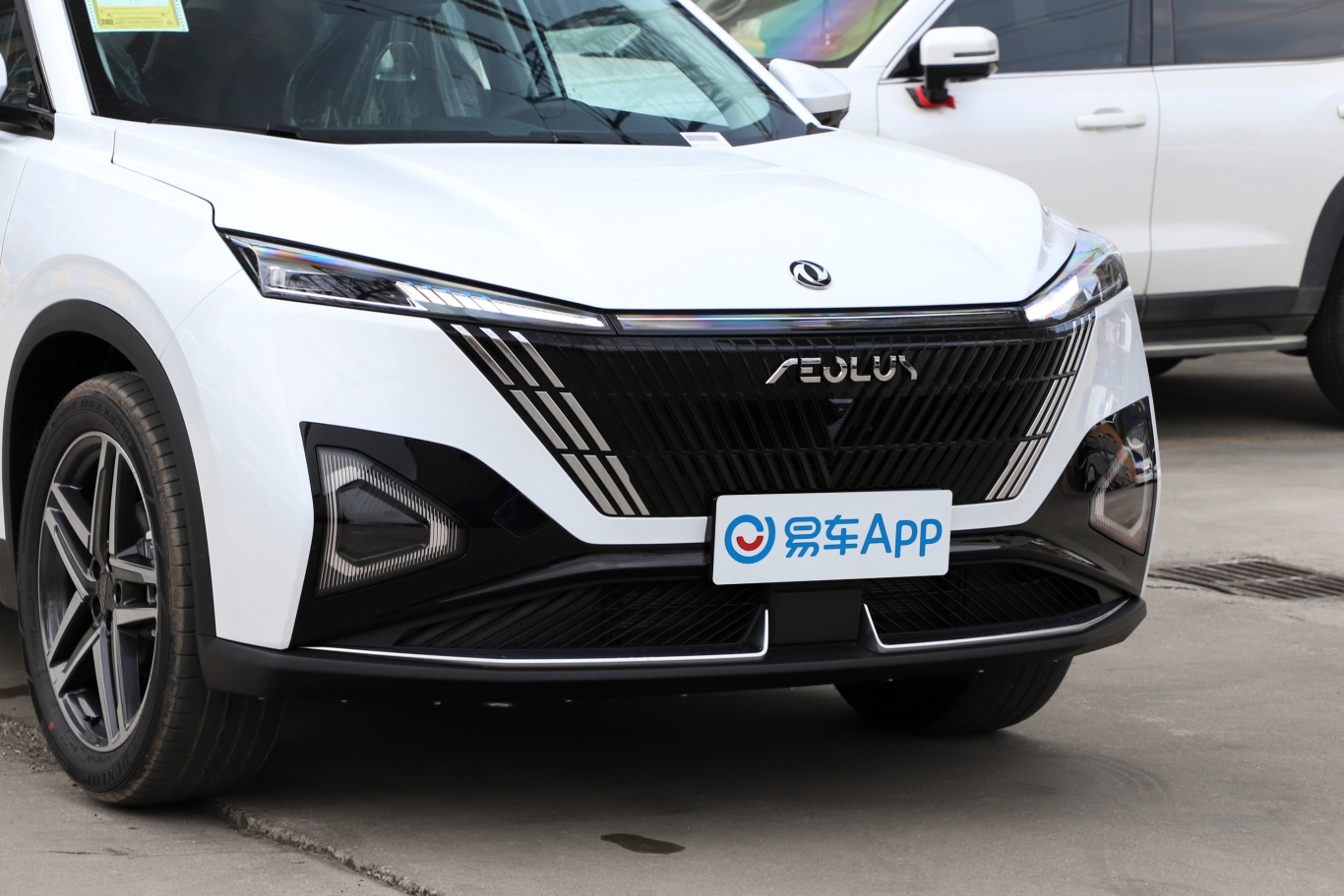 【皓瀚DH-i 1.5T 尊贵版前格栅侧俯拍图片-汽车图片大全】-易车